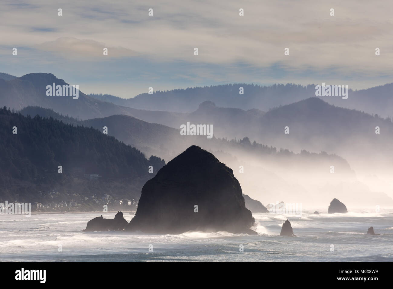 Haystack Rock in Cannon Beach along Oregon Coast in the Pacific Ocean ...