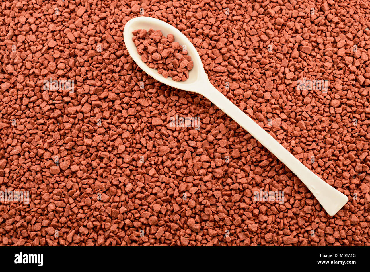 Porcelain laboratory spoon on composite mineral fertilizers Stock Photo ...