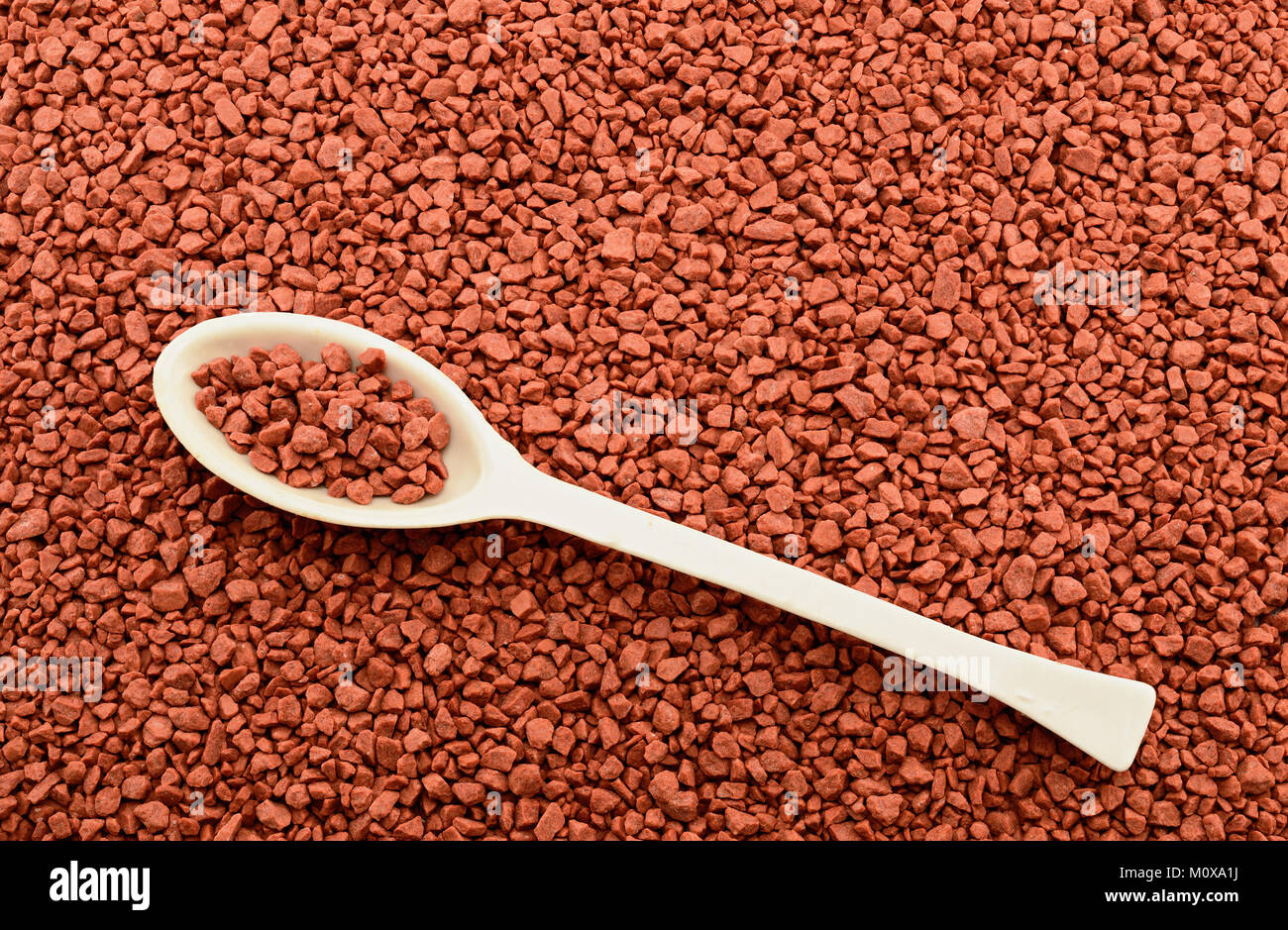 Porcelain laboratory spoon on composite mineral fertilizers Stock Photo ...