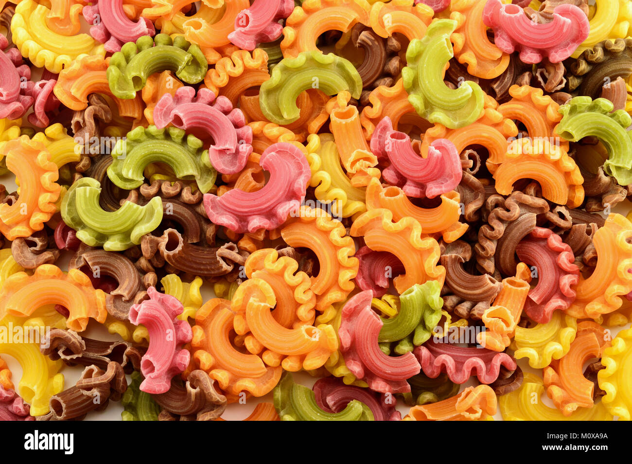 Dry italian pasta in five colours. Background Stock Photo - Alamy