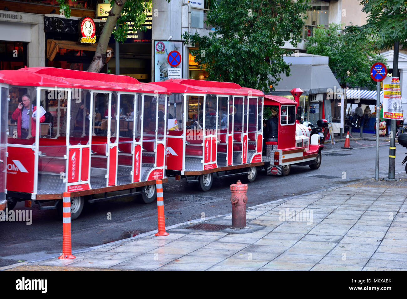 Tourist sightseeing Happy train in central Athens, Greece Stock Photo ...