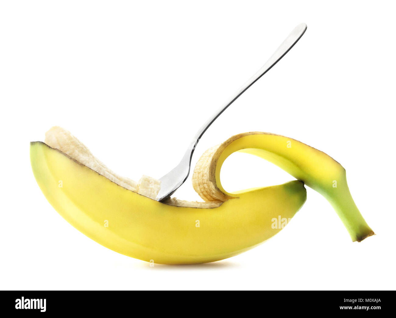 Isolated peeled banana and spoon on white Stock Photo - Alamy