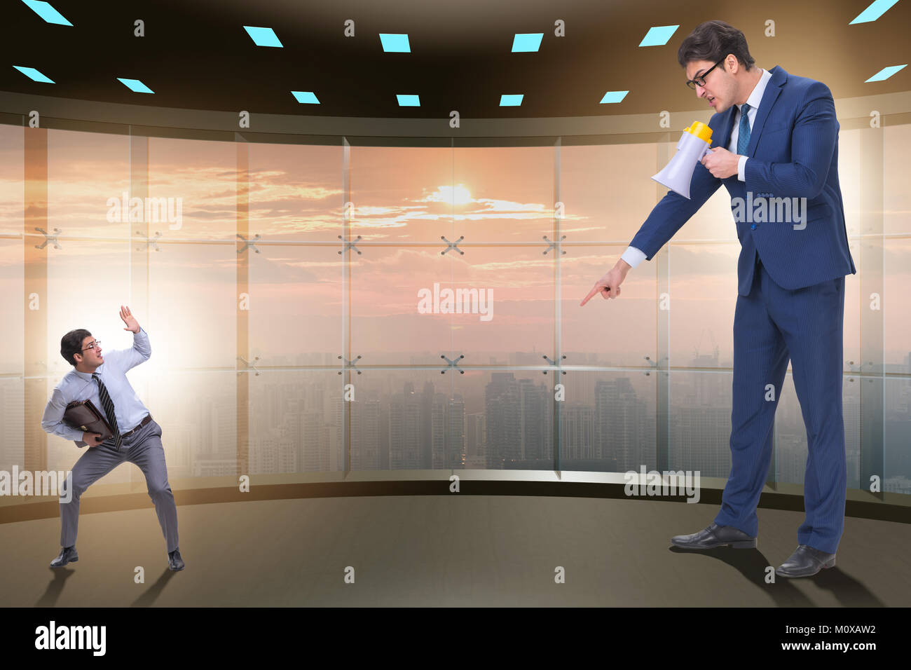 Bad angry boss shouting at employee with loudspeaker Stock Photo - Alamy