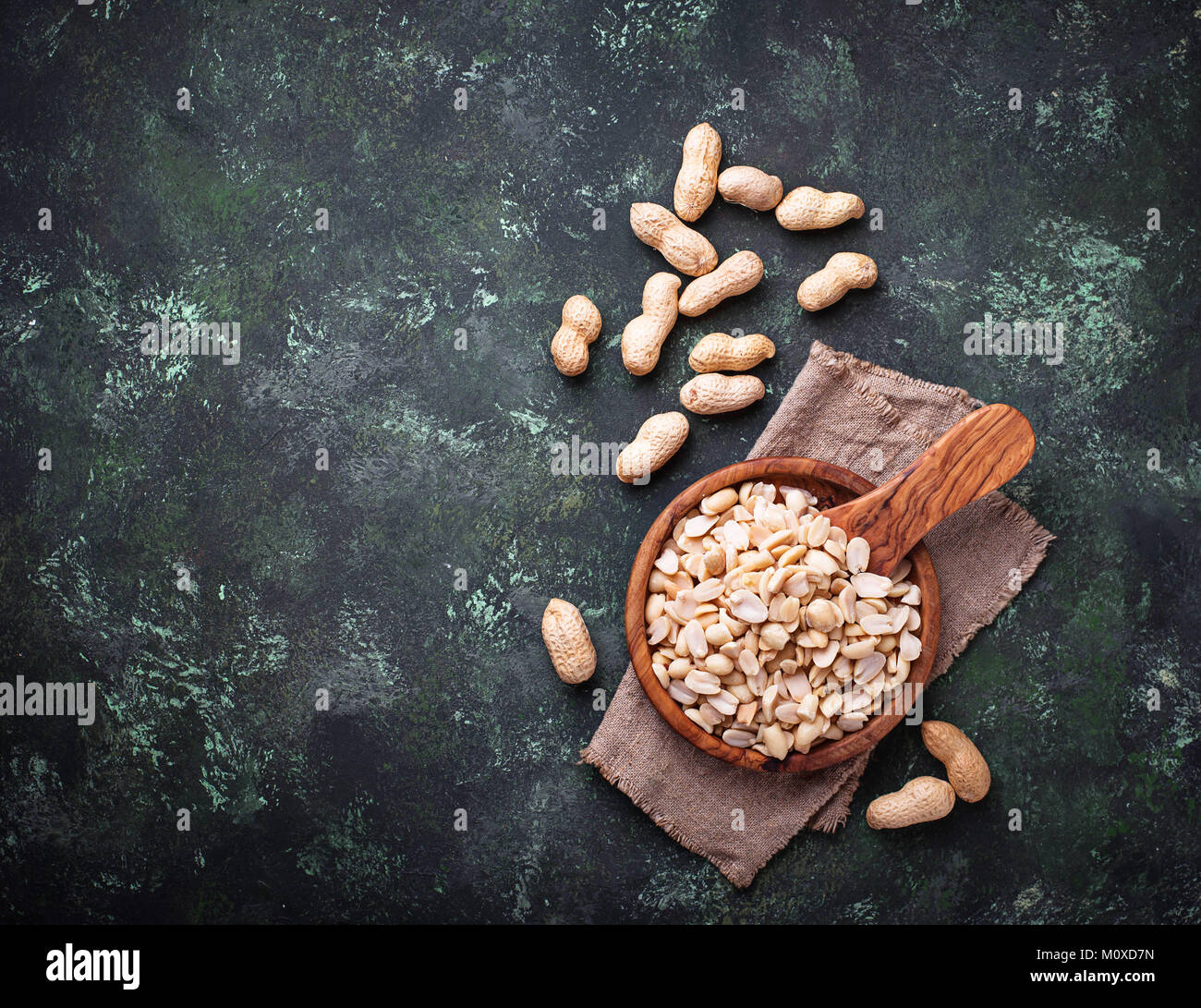Raw peeled peanuts on bowl. Top view Stock Photo - Alamy