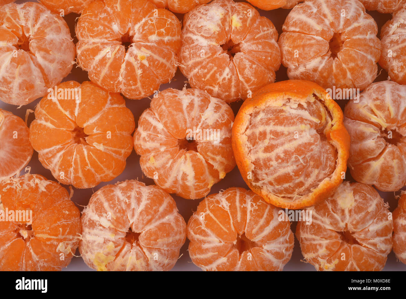 Real fresh red tangerines, peeled, are big pile Stock Photo - Alamy