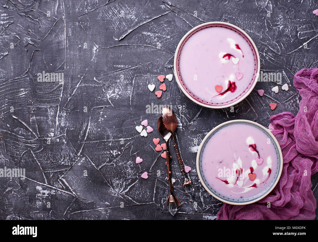 Sweet berry smoothies in bowls. Healthy dessert. Top view Stock Photo ...