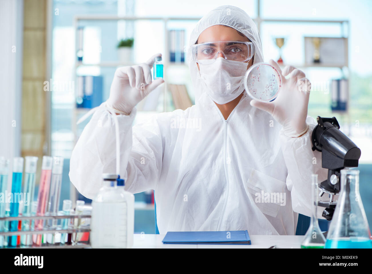 Chemist working in the laboratory with hazardous chemicals Stock Photo ...