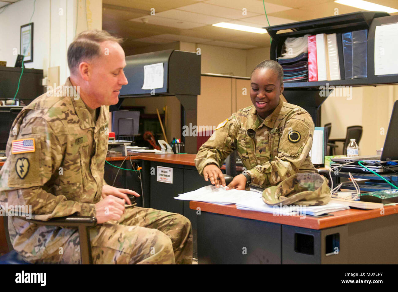 Spc. Jillian Puplampu a human resource specialist with Headquarters and ...