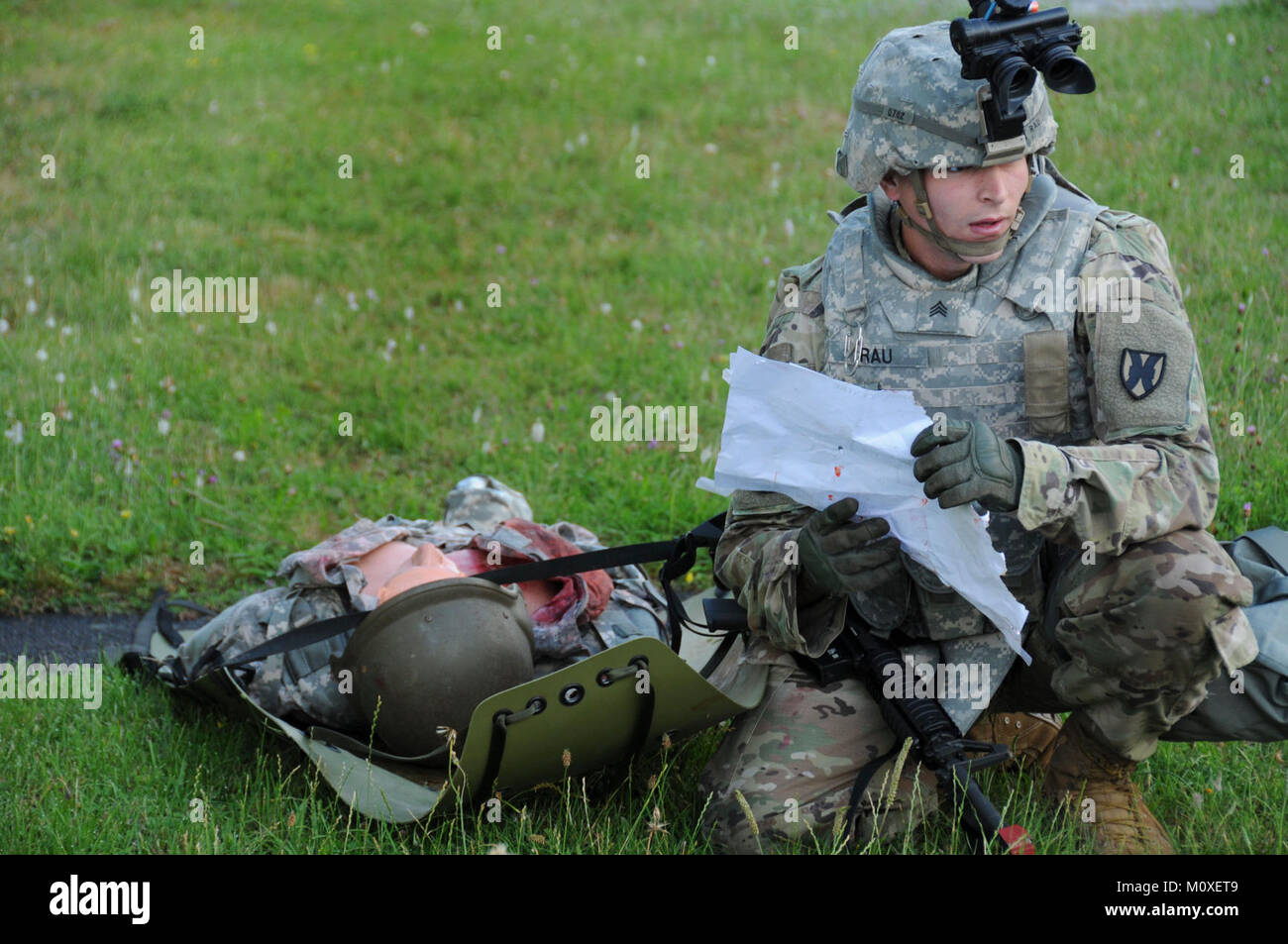 Sgt. Jacob Rau, mortuary non-commissioned officer, 21st Special Troops ...