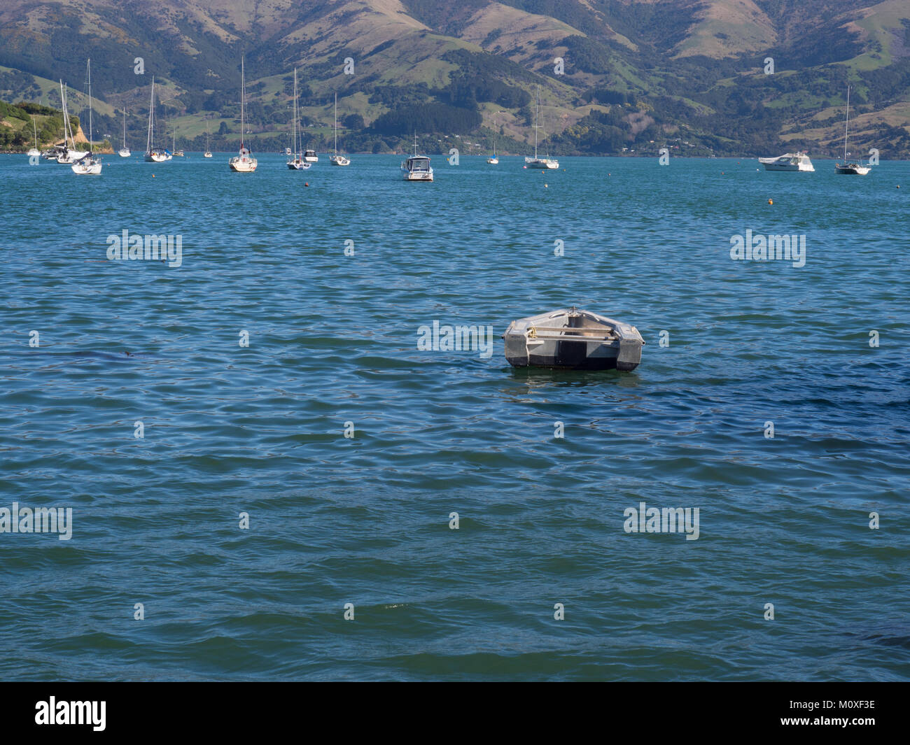Boats On Akaroa Harbour Stock Photo - Alamy