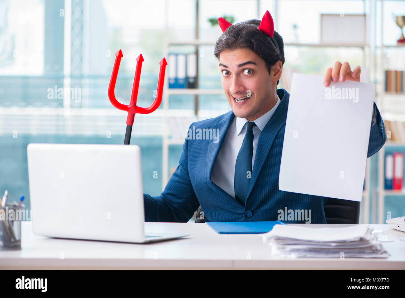 Devil angry businessman in the office Stock Photo - Alamy