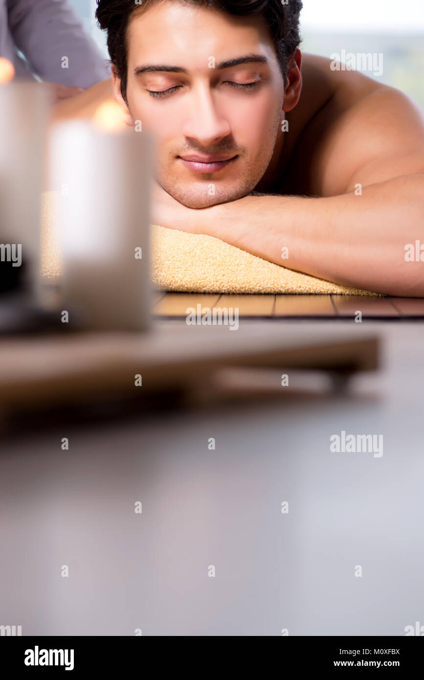Young handsome man during spa procedure Stock Photo - Alamy