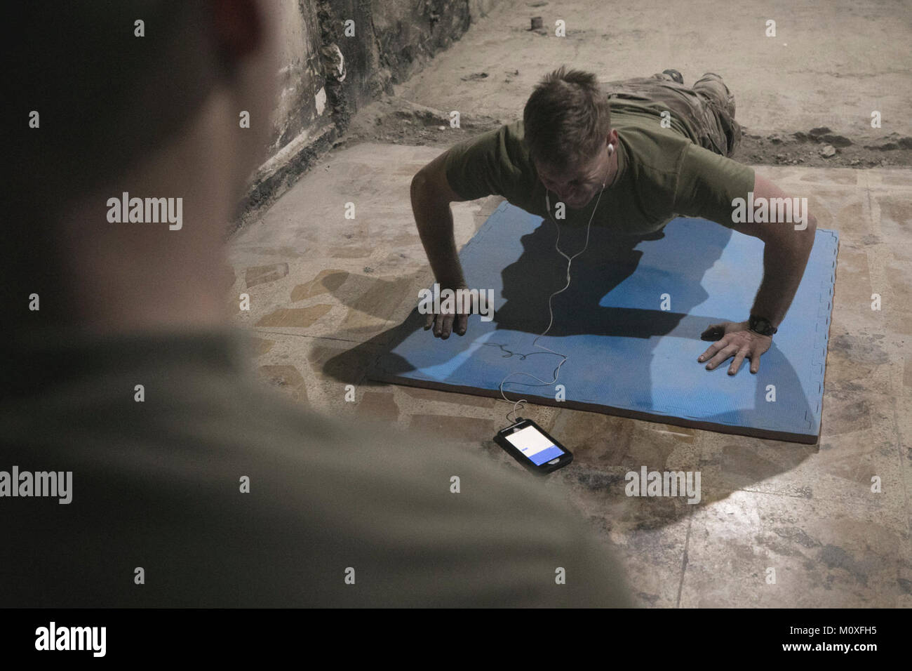 U.S. Soldiers workout together, in between missions, during morale time ...