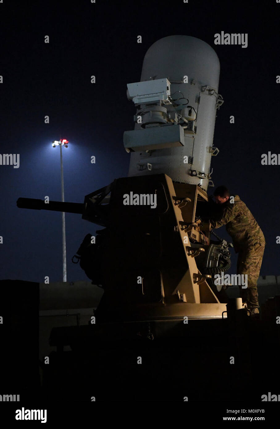 A U.S. Army Soldier performs maintenance on a Counter Rocket, Artillery ...