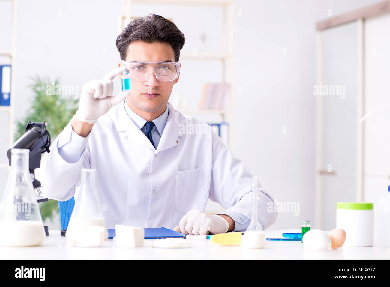 Food scientist testing new stuff in the lab Stock Photo - Alamy