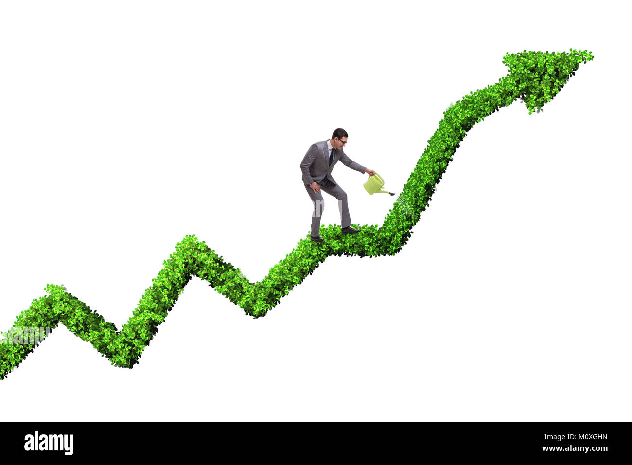 Businessman in investment concept watering financial line chart Stock ...