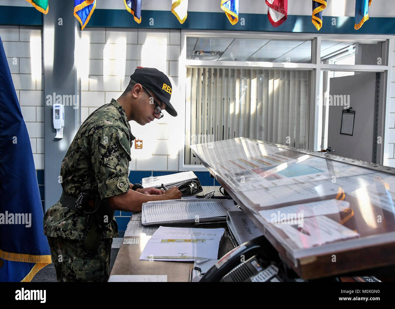 LAKES, Ill. (Jan. 18, 2018) A U.S. Navy recruit stands quarterdeck ...