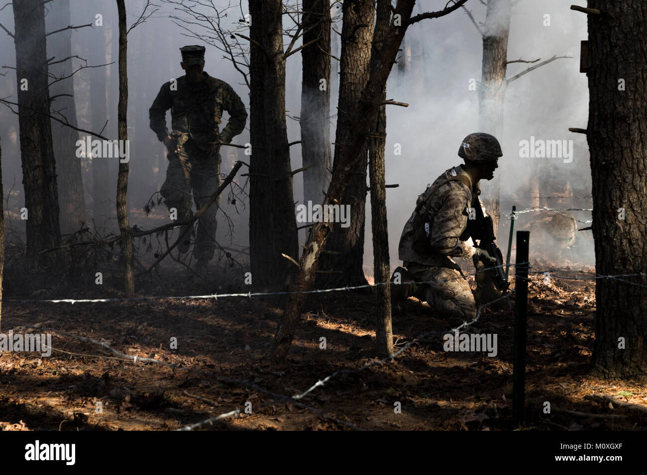 A U.S. Marine Corps officer candidate participates in a fire team ...