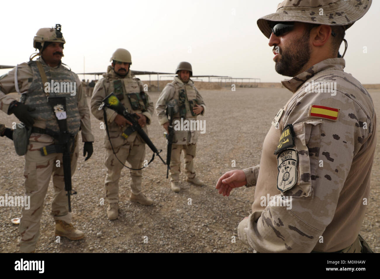 A Spanish instructor goes over rifle fundamentals and use of body armor ...