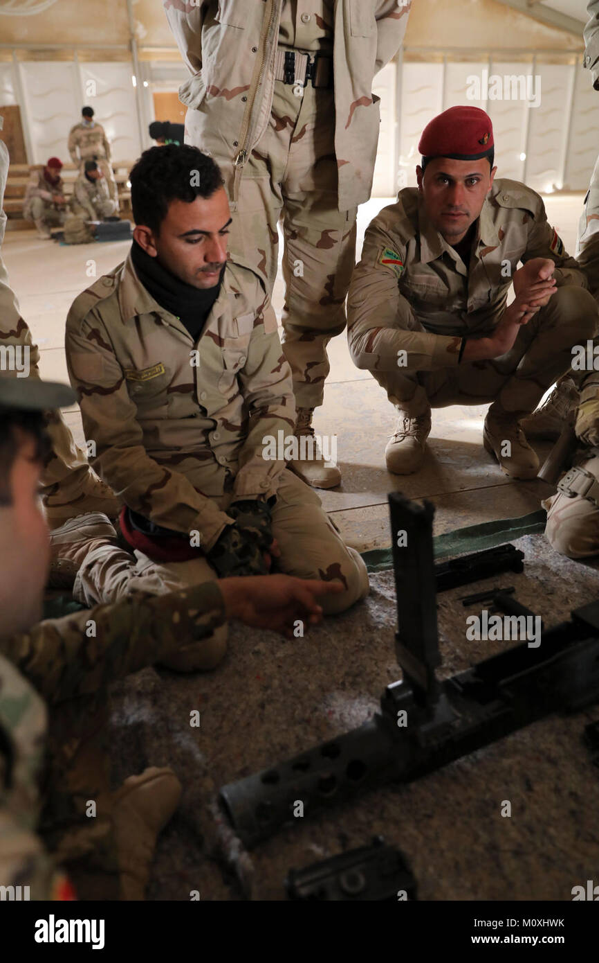 Iraqi army soldiers from the 38th Brigade, learn how to disassemble a ...
