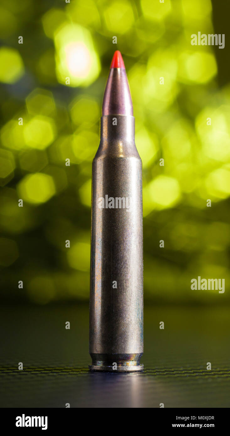 Cartridge for a modern sporting rifle with a yellow background Stock ...