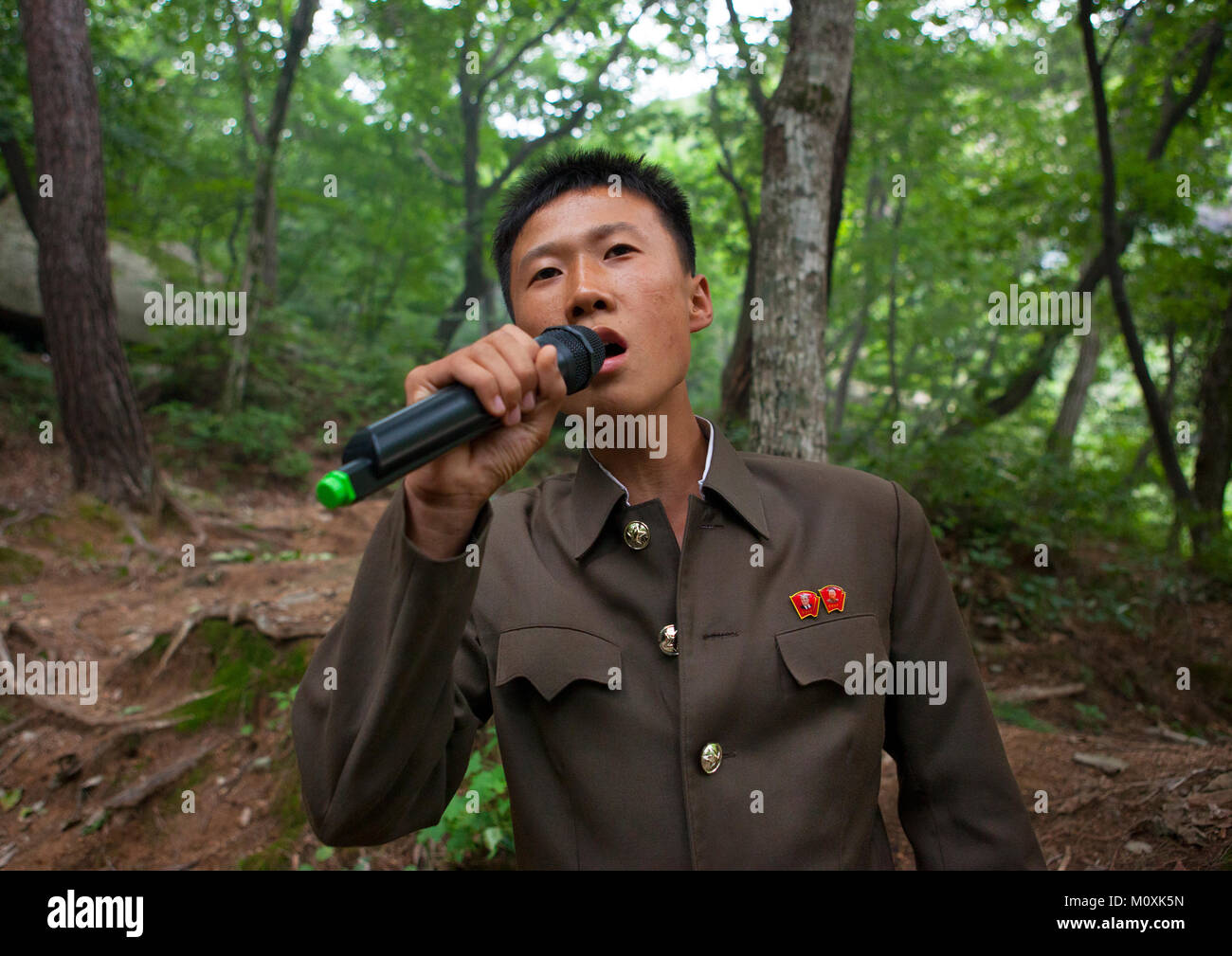 North Korean soldier singing in a park, North Hwanghae Province ...