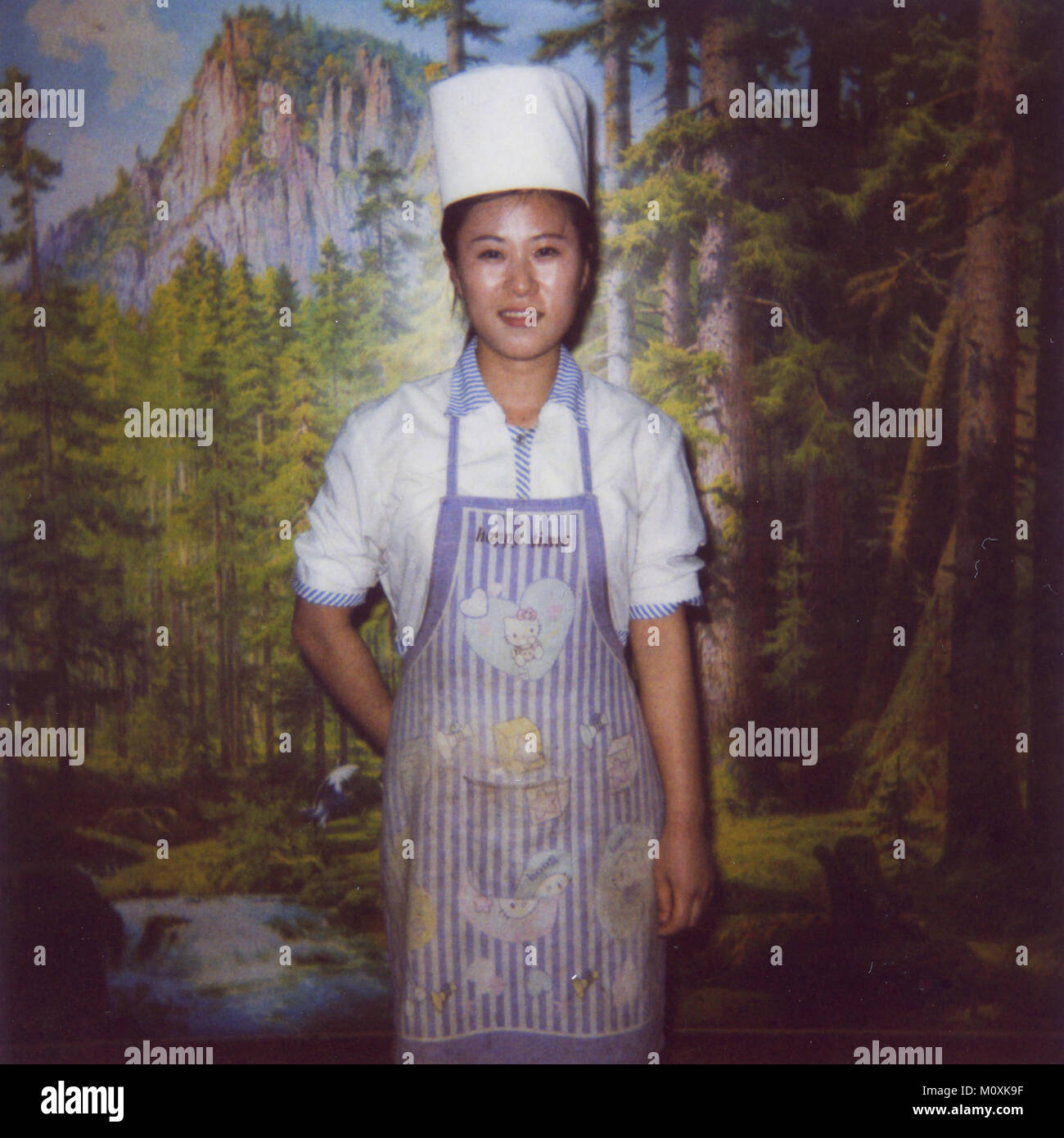 Polaroid of a smiling North Korean cook woman, Pyongan Province ...