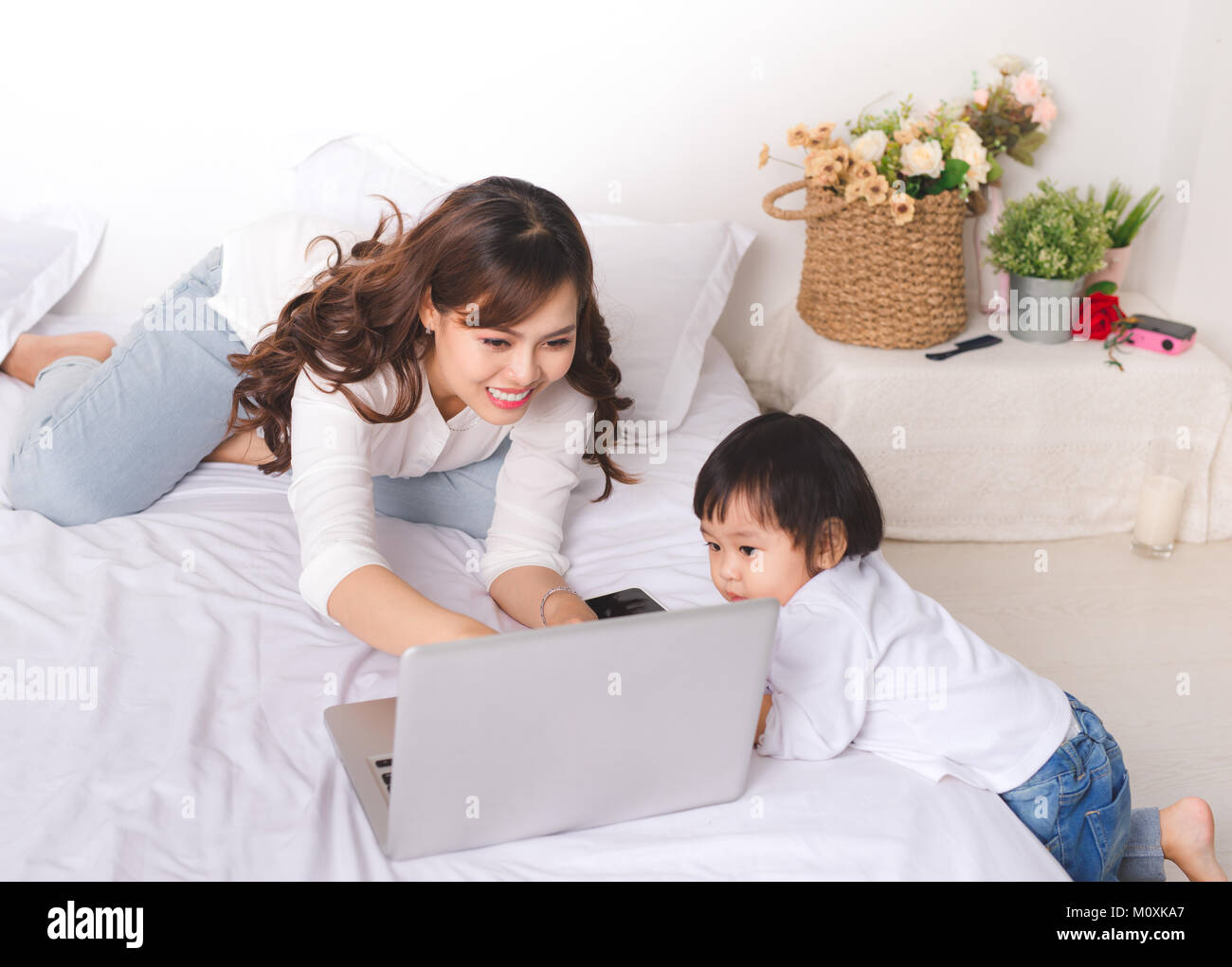 Baby working on laptop hi-res stock photography and images - Alamy