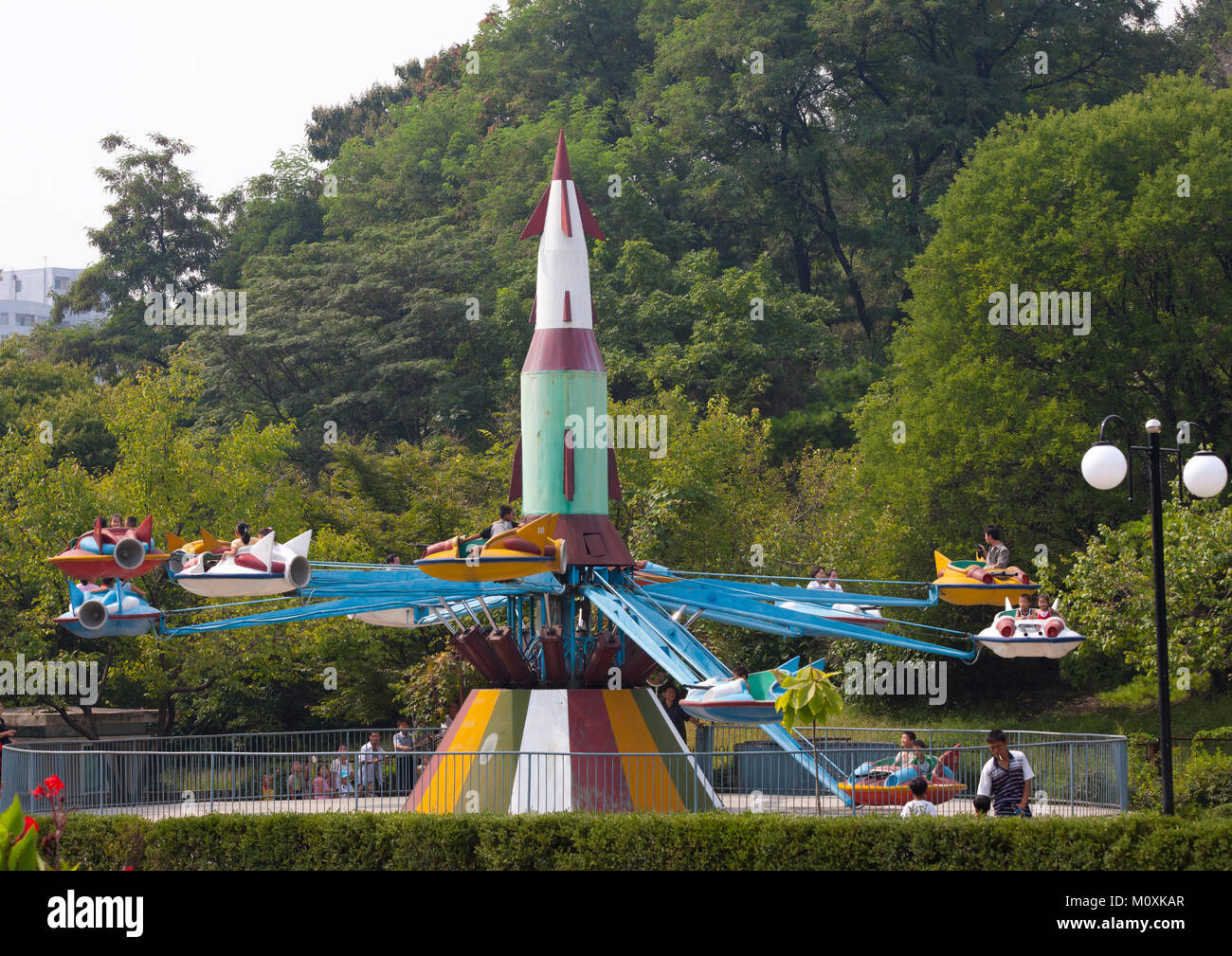 Old rocket fairground attraction in Taesongsan funfair, Pyongan ...
