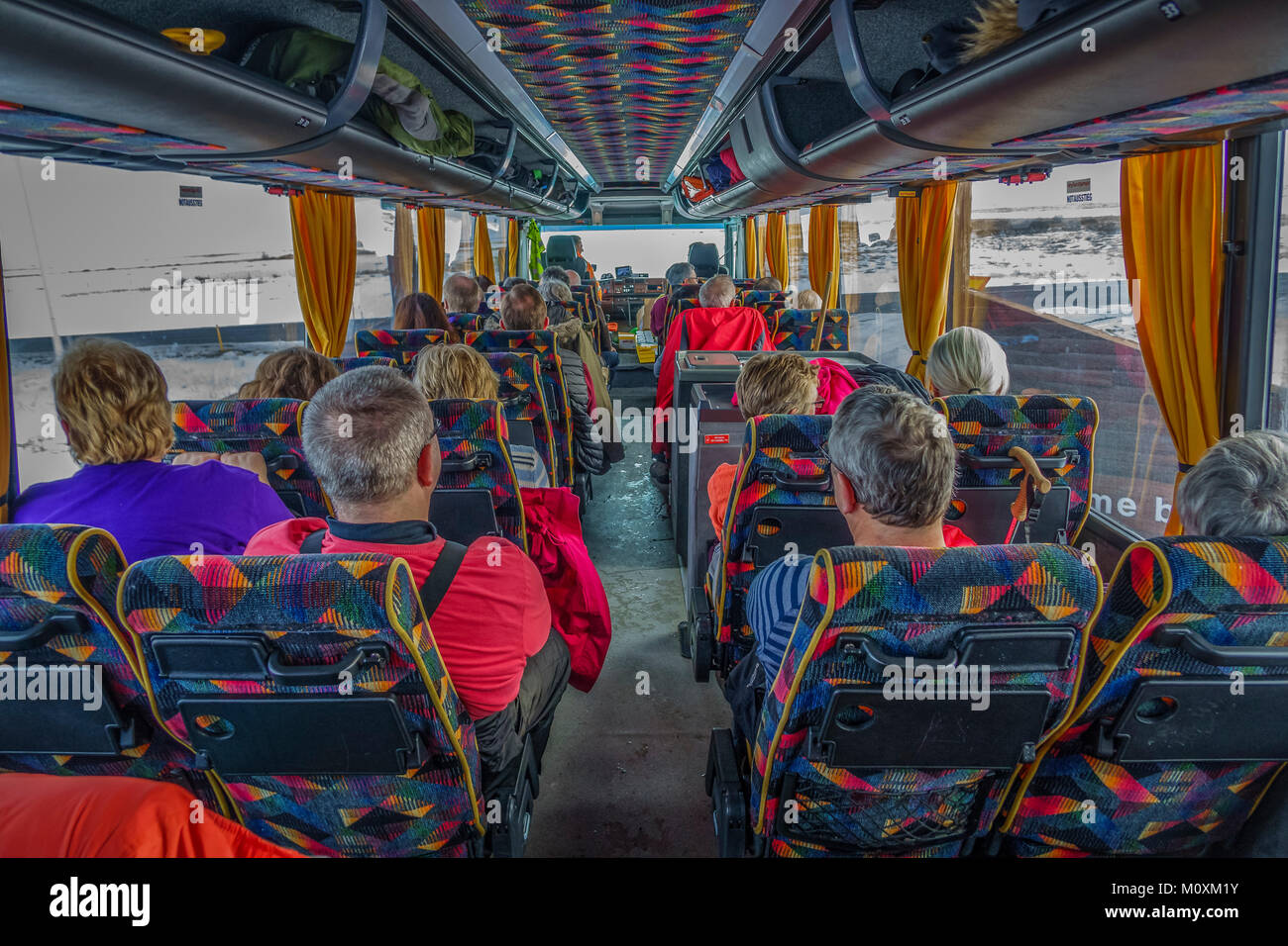 Tourists on a bus trip, Iceland Stock Photo - Alamy