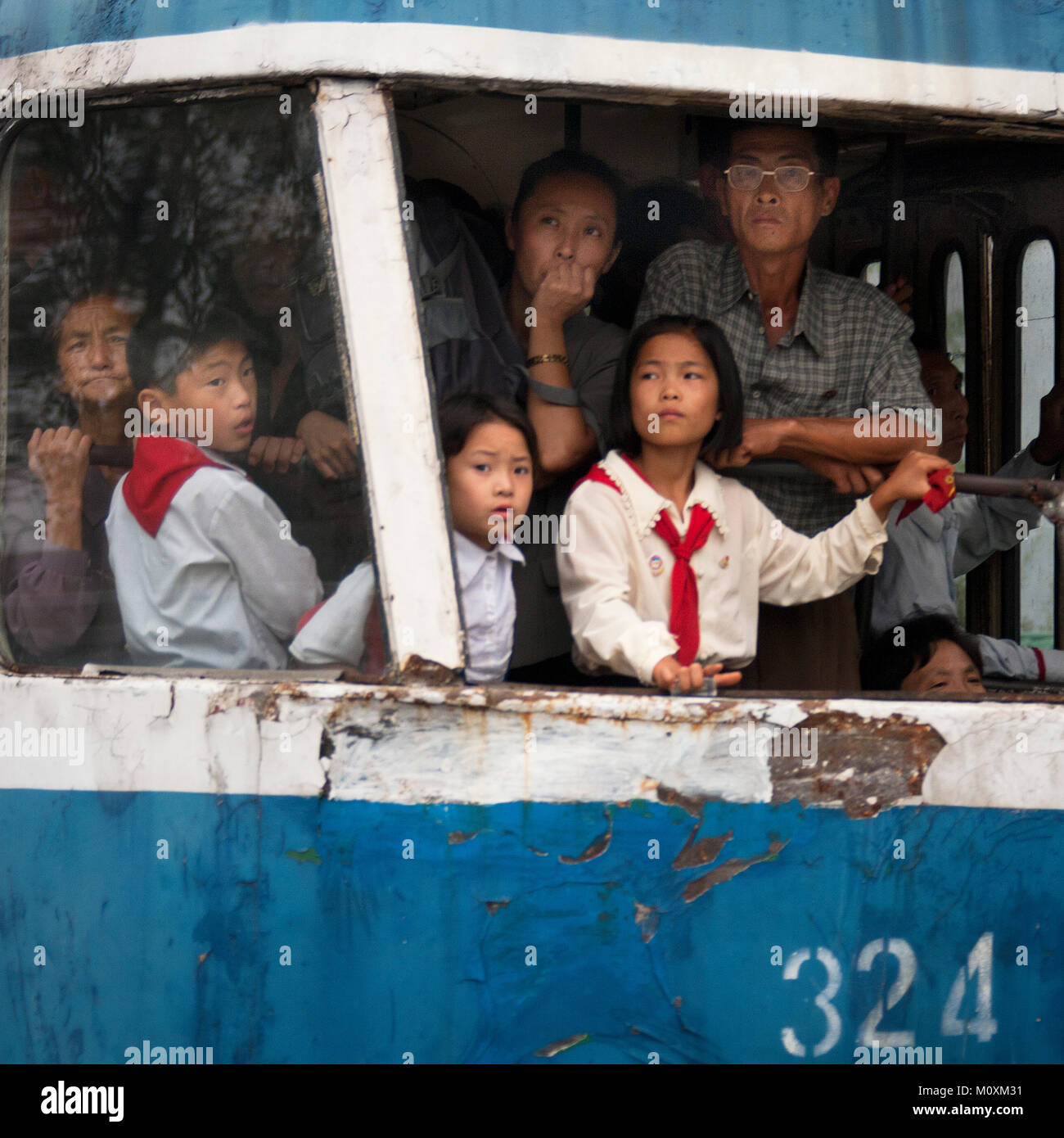 North Korean people in a shabby tram, Pyongan Province, Pyongyang ...