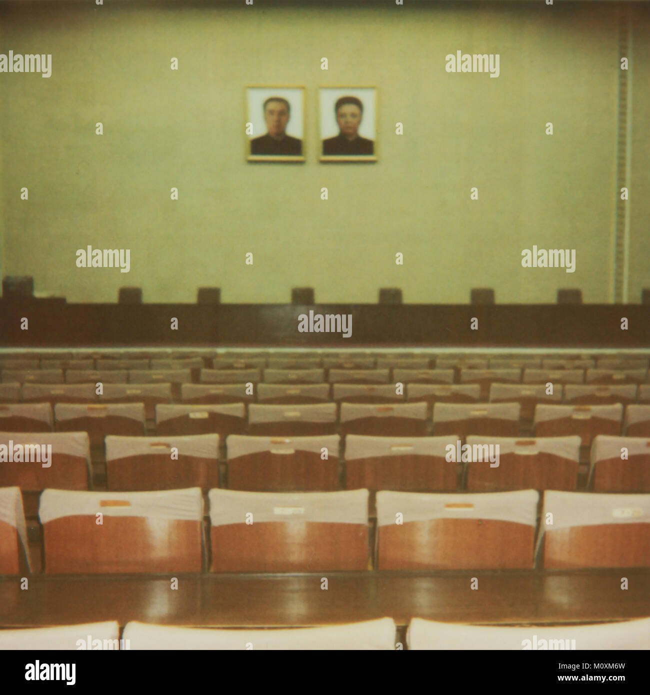 Polaroid of the Dear Leaders portraits in a meeting room, Pyongan ...