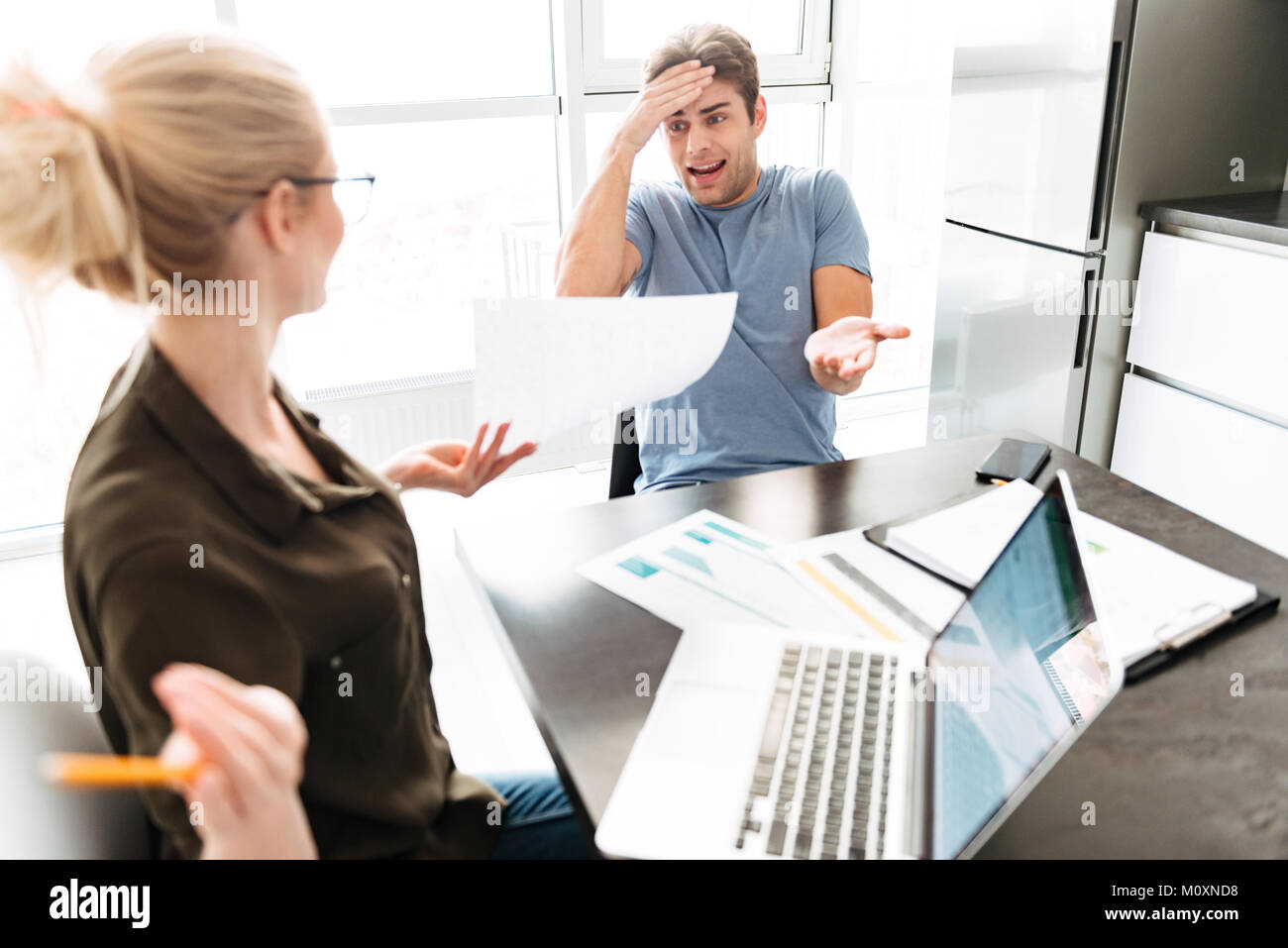 Angry working man and wife hi-res stock photography and images - Alamy