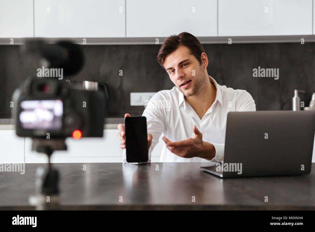 Man filming video with mobile phone hi-res stock photography and images ...