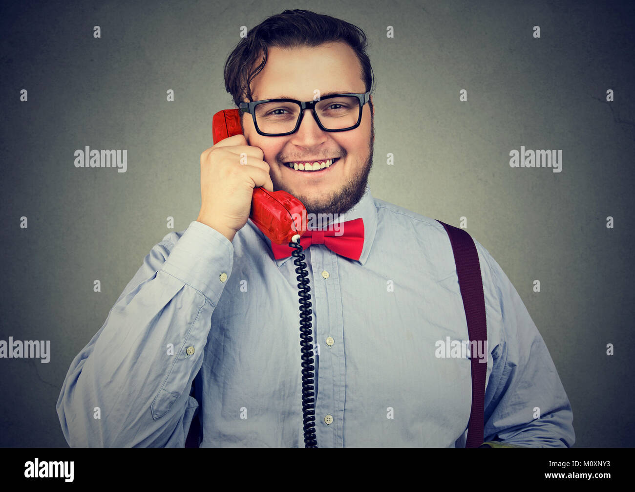 Happy delighted man talking hi-res stock photography and images - Alamy