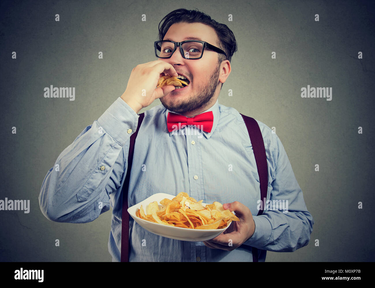Man indulgence hi-res stock photography and images - Alamy