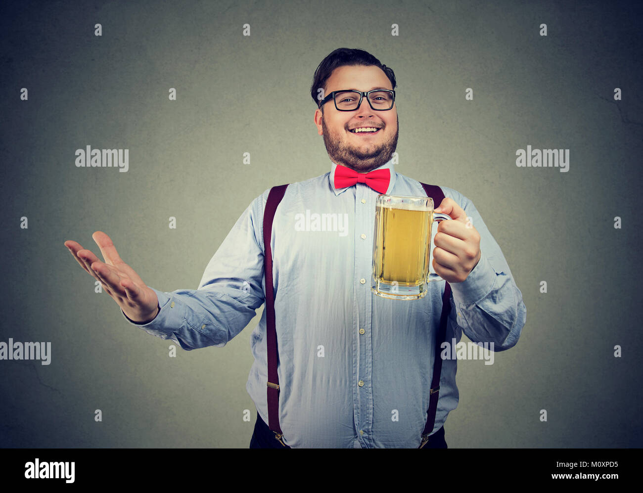 Chunky man in formal outfit and eyeglasses posing happily at camera ...