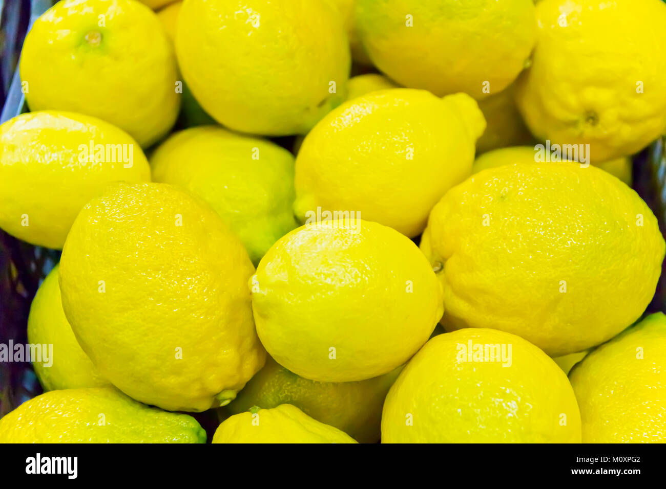 Photo of background with yellow ripe lemon Stock Photo - Alamy