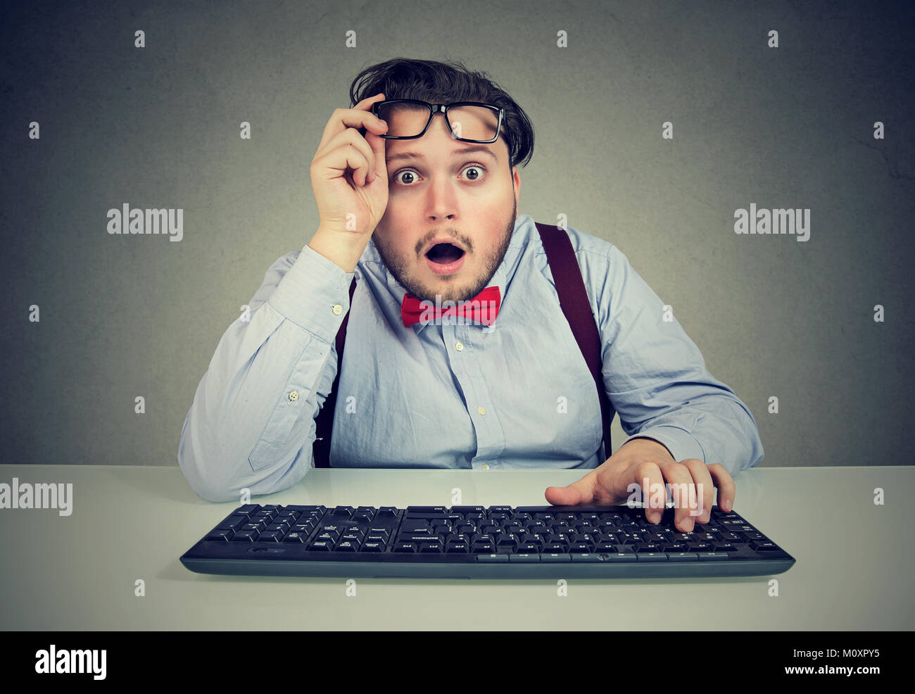Man watching shocking breaking hi-res stock photography and images - Alamy