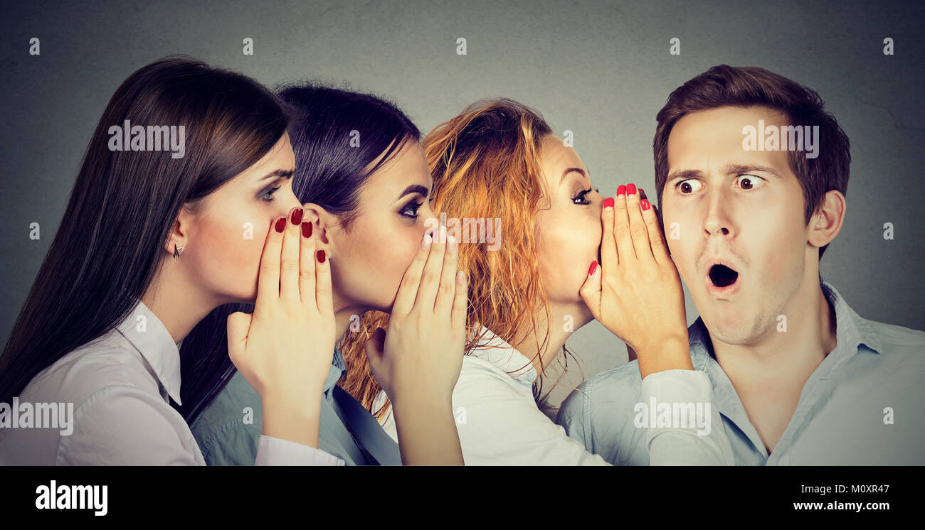 Women telling gossip and sharing with rumors talking to man on gray ...