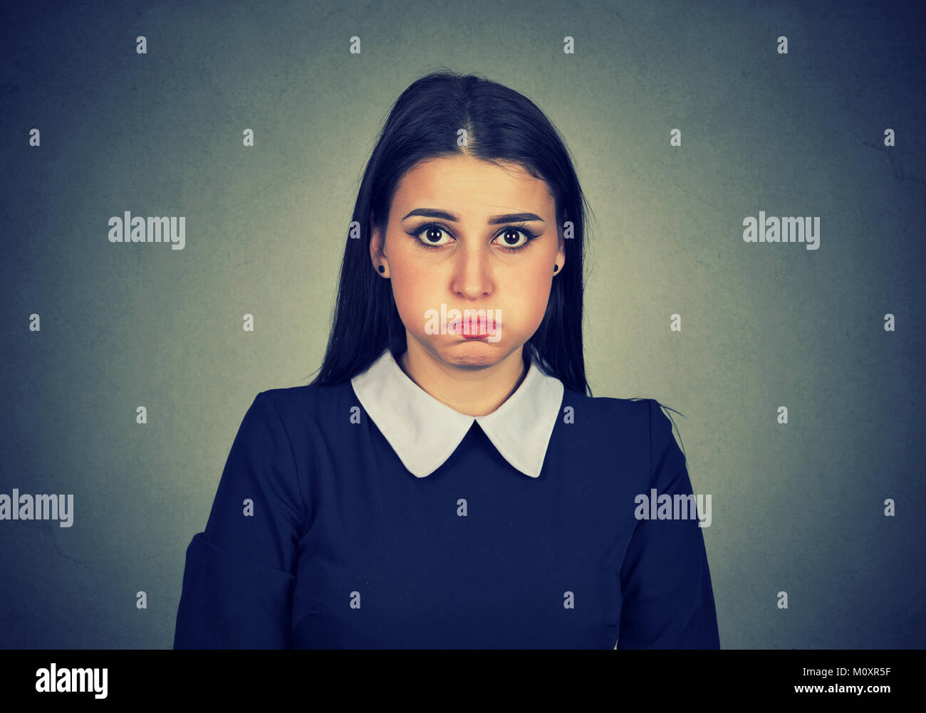 Woman puffing cheeks hi-res stock photography and images - Alamy