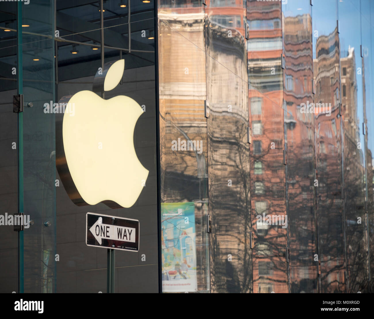 The Apple shines over the Upper West Side neighborhood Apple store in ...