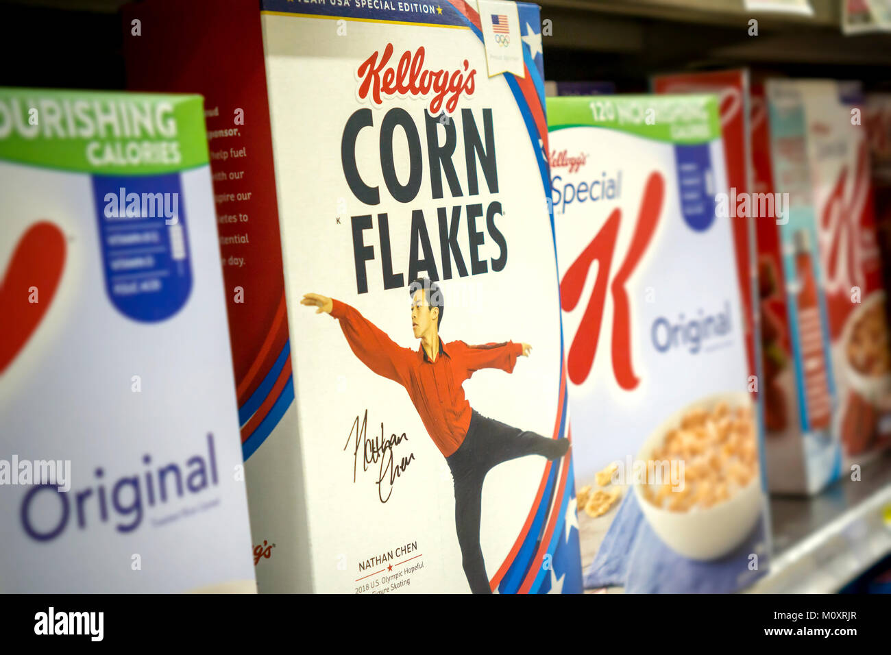 Boxes of Kellogg's Corn Flakes breakfast cereal featuring the figure ...