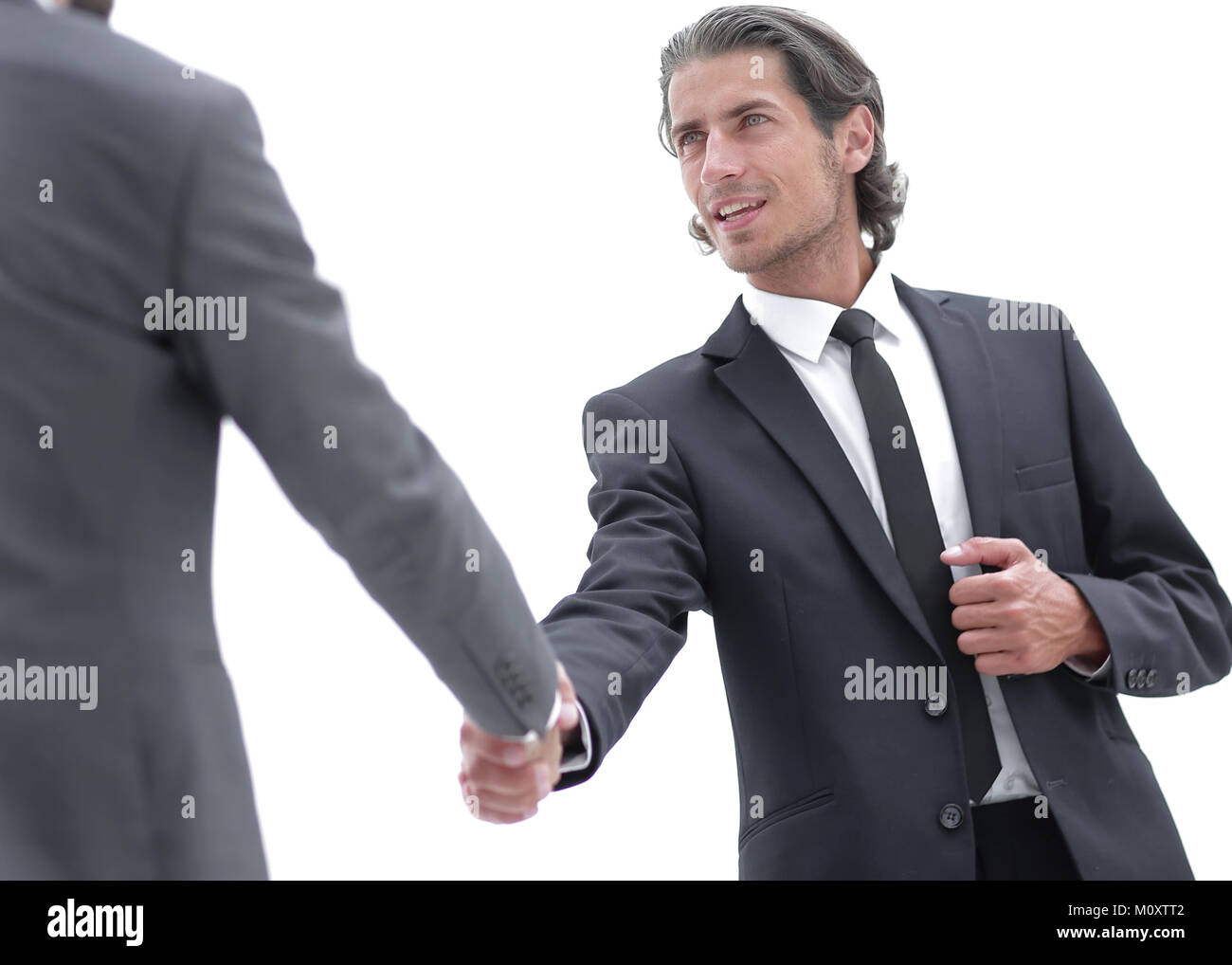 welcome and handshake of business partners Stock Photo - Alamy