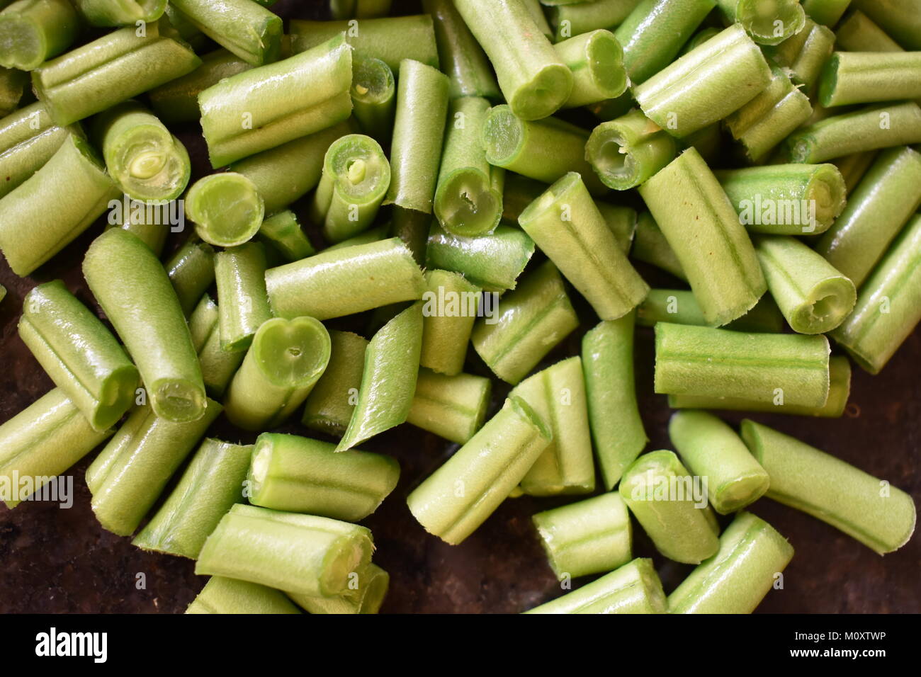 Slice piece of beans at kitchen Stock Photo - Alamy