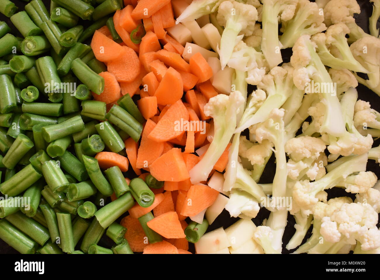 mix vegetable like carrot ,cauliflower, potato,beans at kitchen after ...