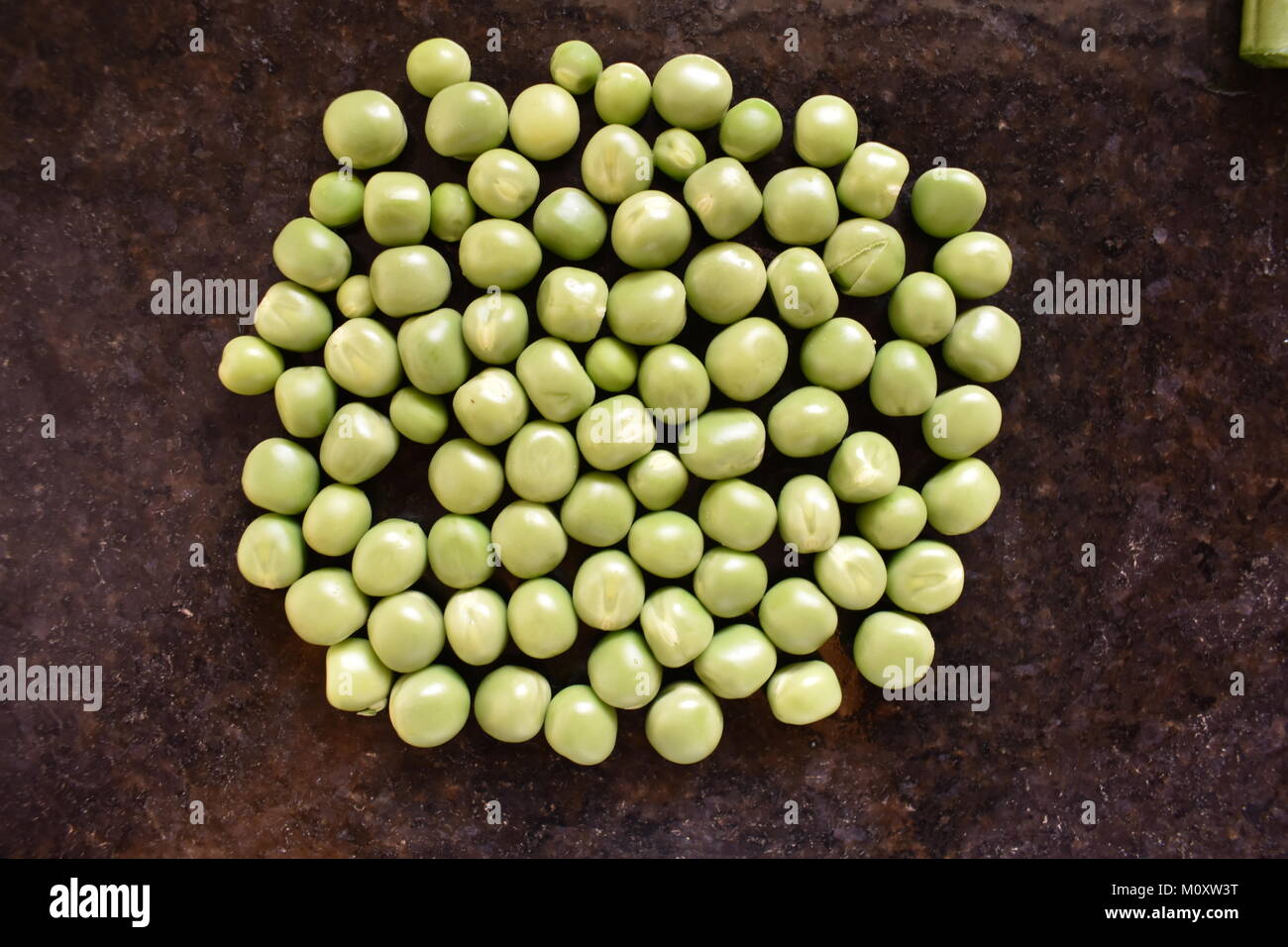 peas at kitchen after pealing Stock Photo - Alamy