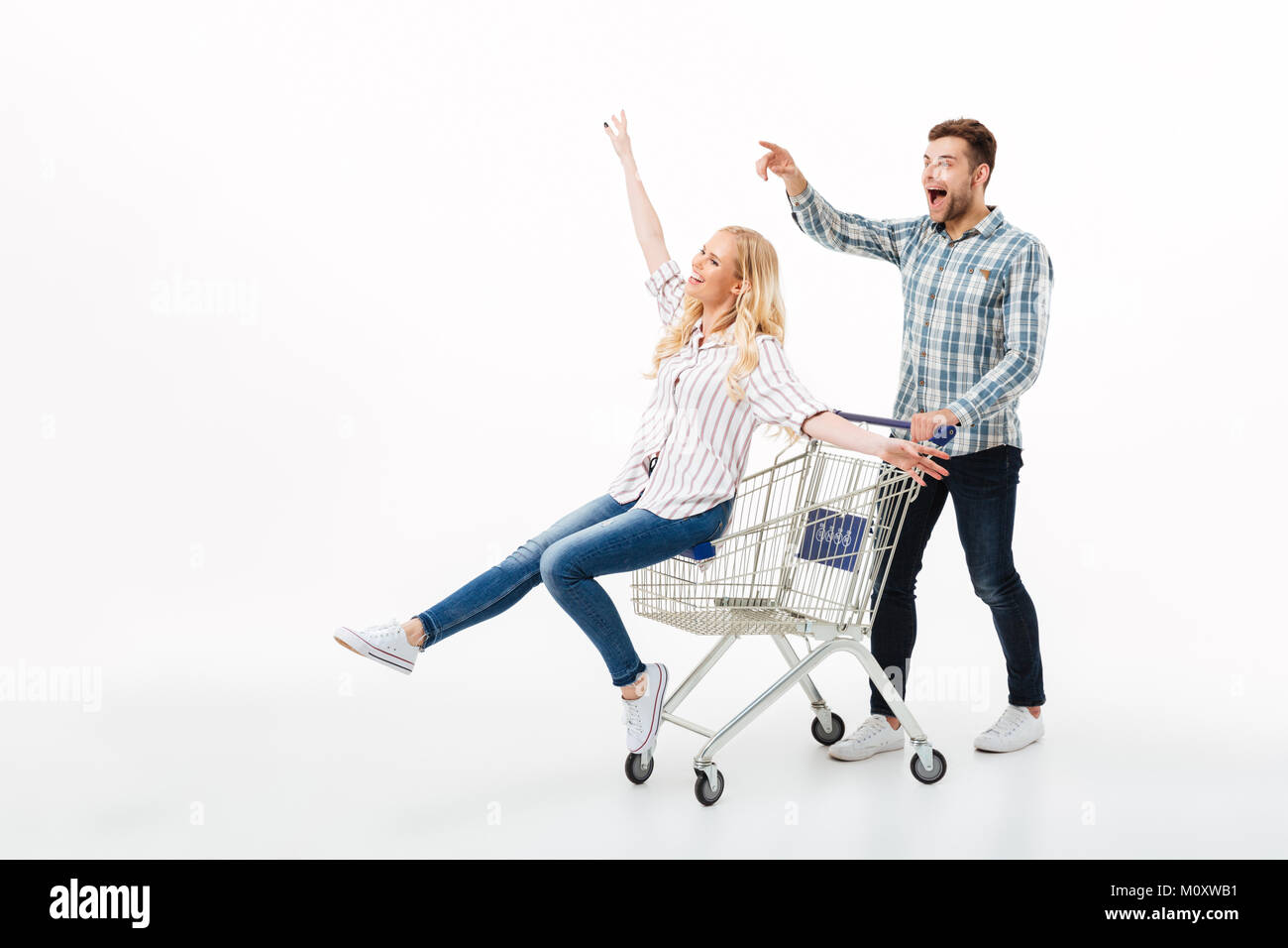 Shopping trolley riding hi-res stock photography and images - Alamy