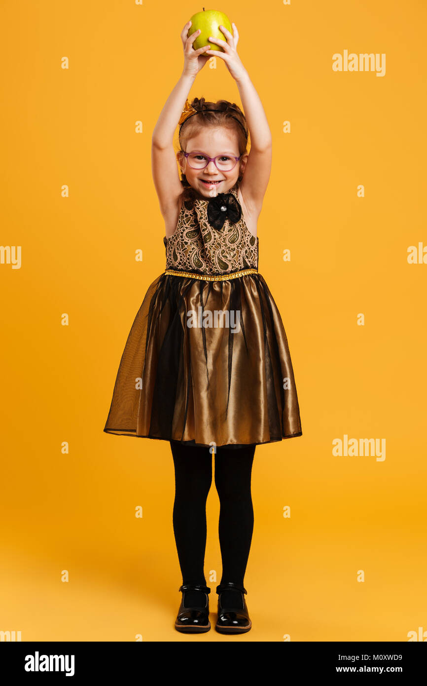 Image of laughing girl child wearing princess crown standing isolated ...
