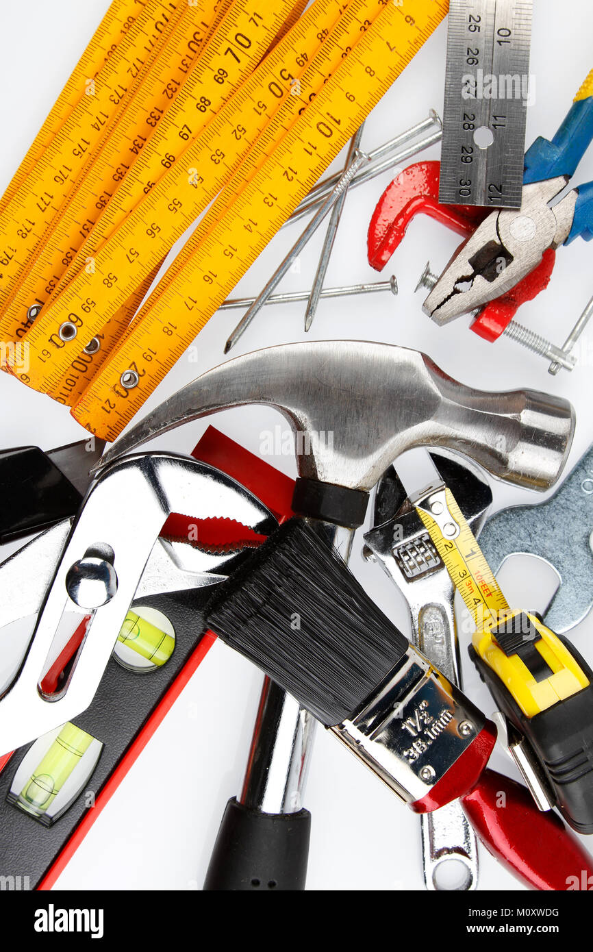 Assortment of tools on plain background Stock Photo - Alamy